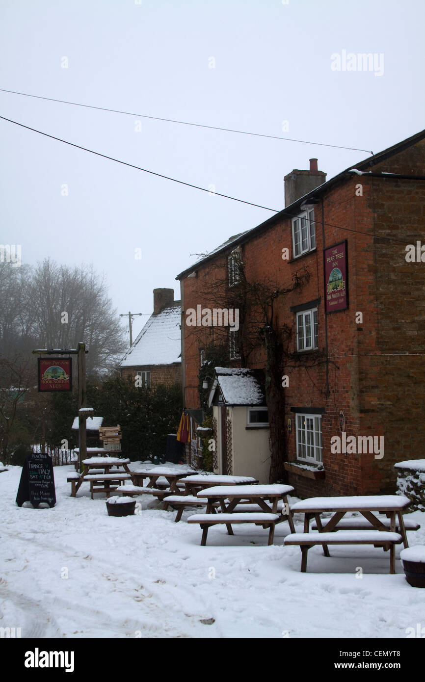 Pear Tree Inn in Winter Snow Stock Photo - Alamy