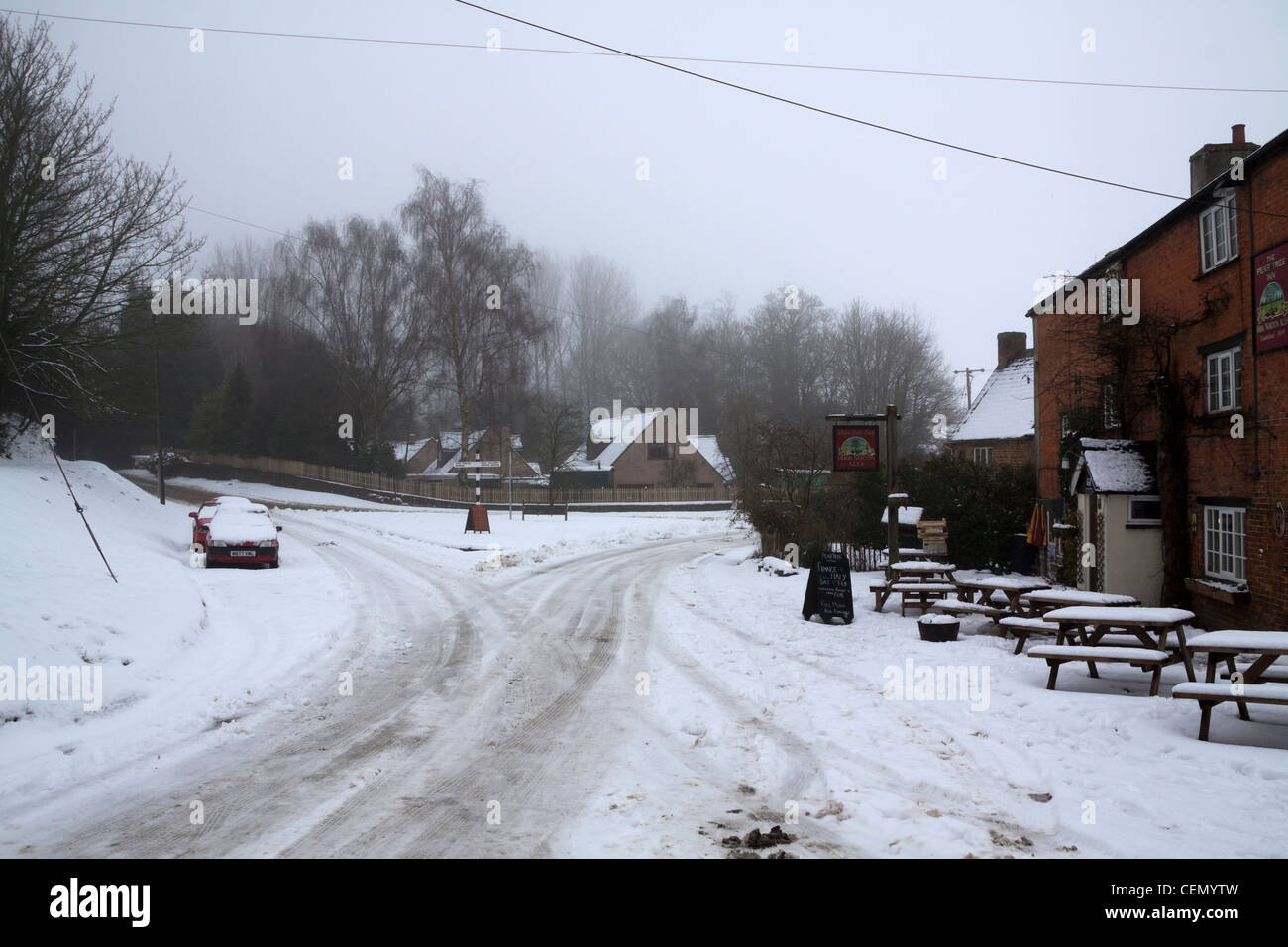 Road signs in snow junction hi-res stock photography and images - Alamy