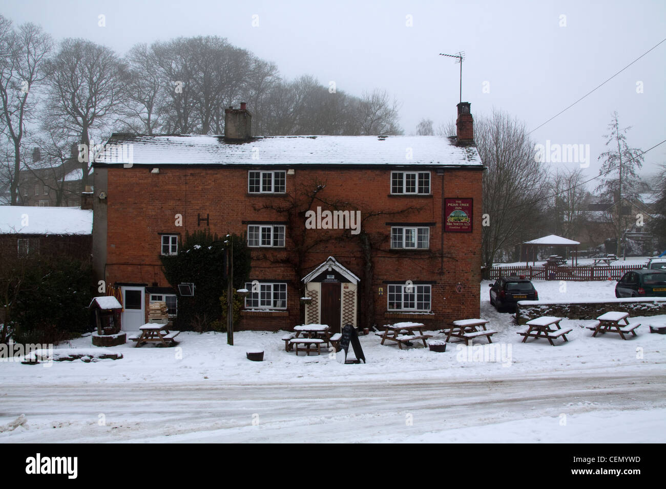 Pear Tree Inn in Winter Snow Stock Photo - Alamy