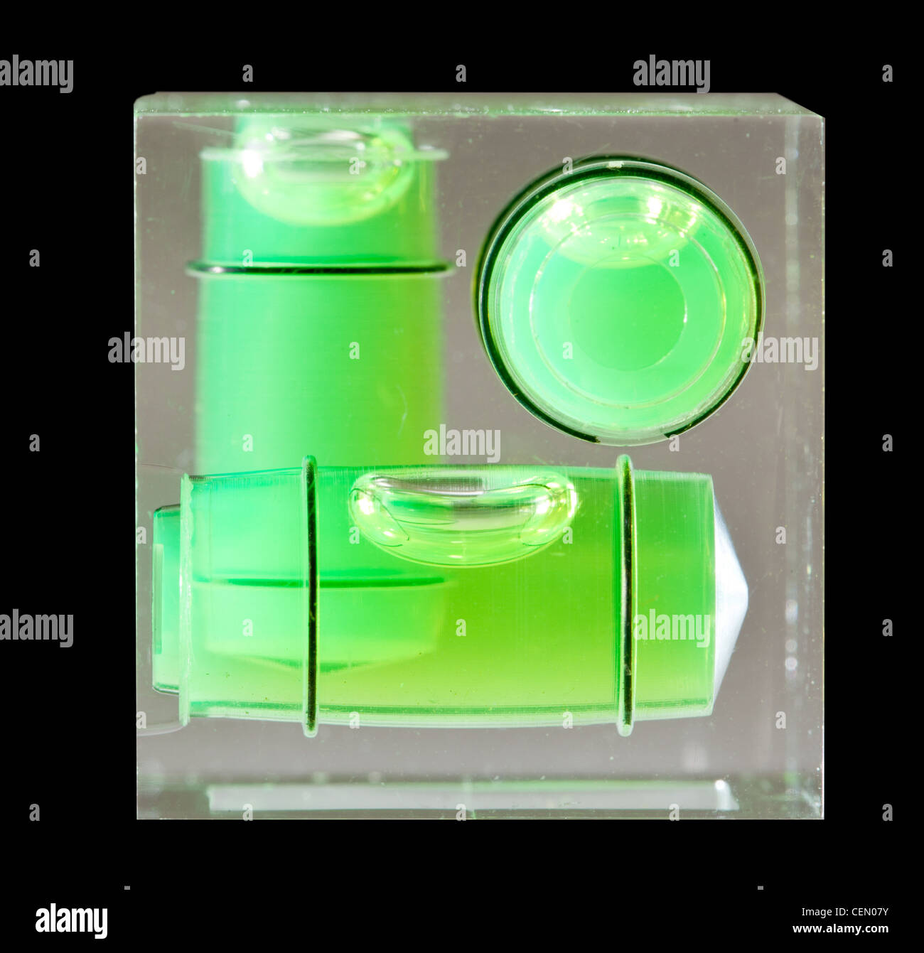 Three green spirit levels in plastic cube setting angle in any ...