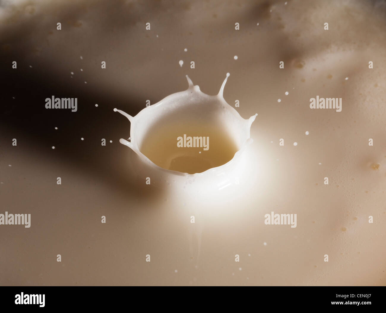 Shapes created by drops of milk and milk splashes Stock Photo - Alamy
