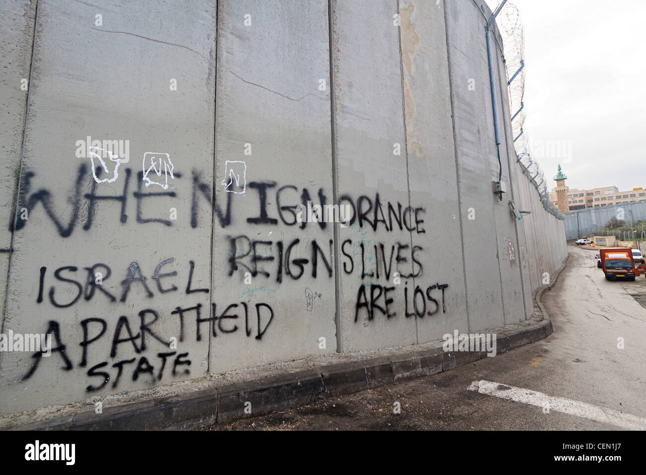 Graffiti on the security wall built to separate Jewish and Arab sectors ...