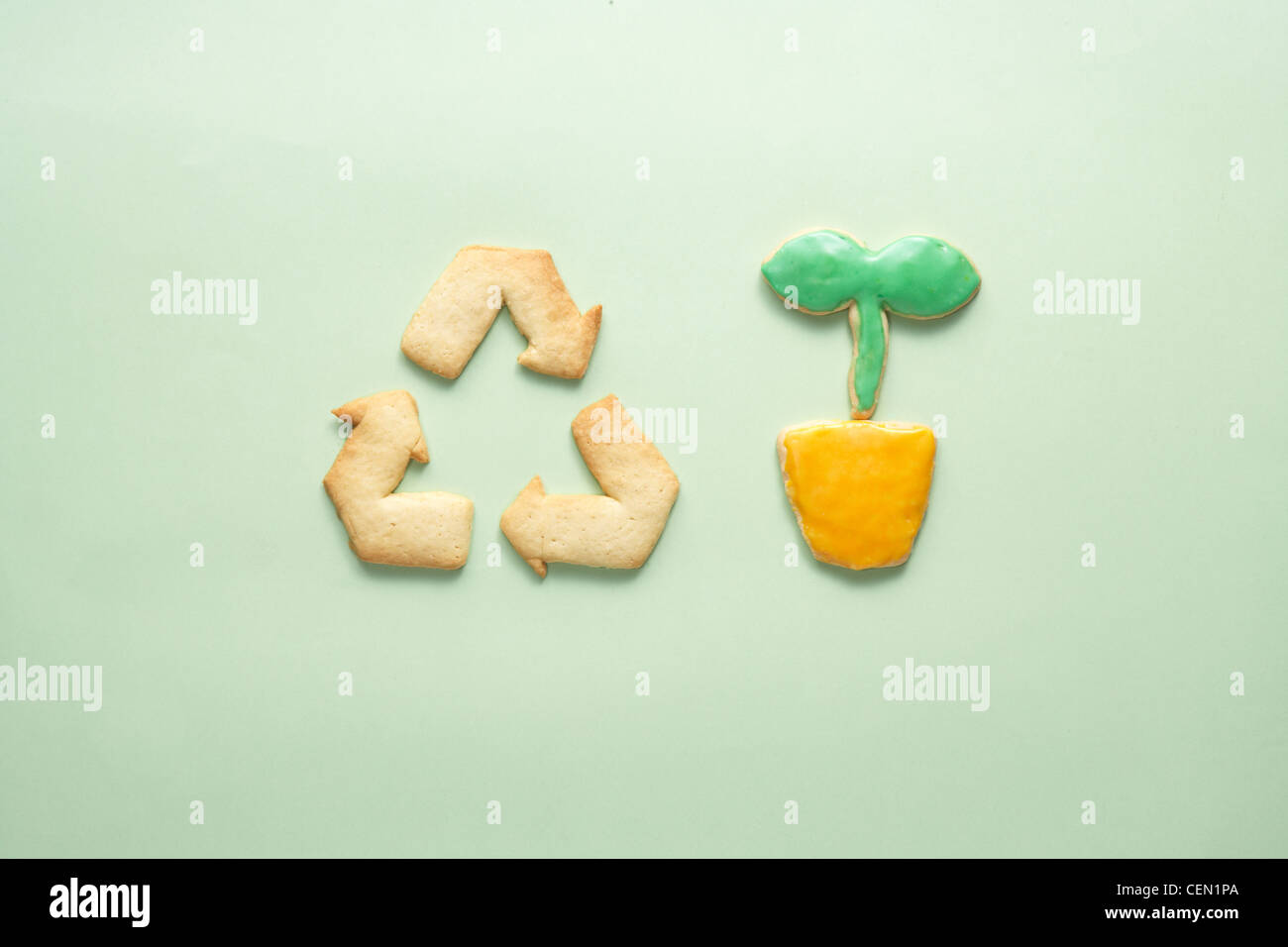 Cookies of recycling symbol and potted plant Stock Photo - Alamy