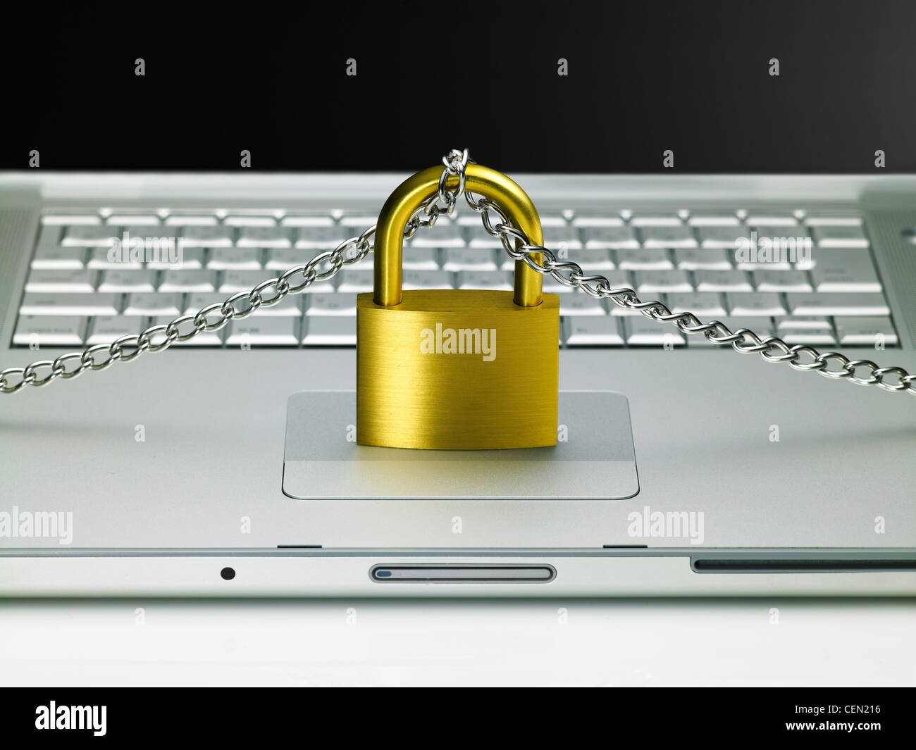 Laptop and padlock Stock Photo - Alamy