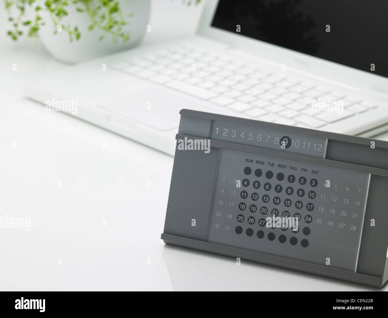 Laptop and calendar Stock Photo - Alamy
