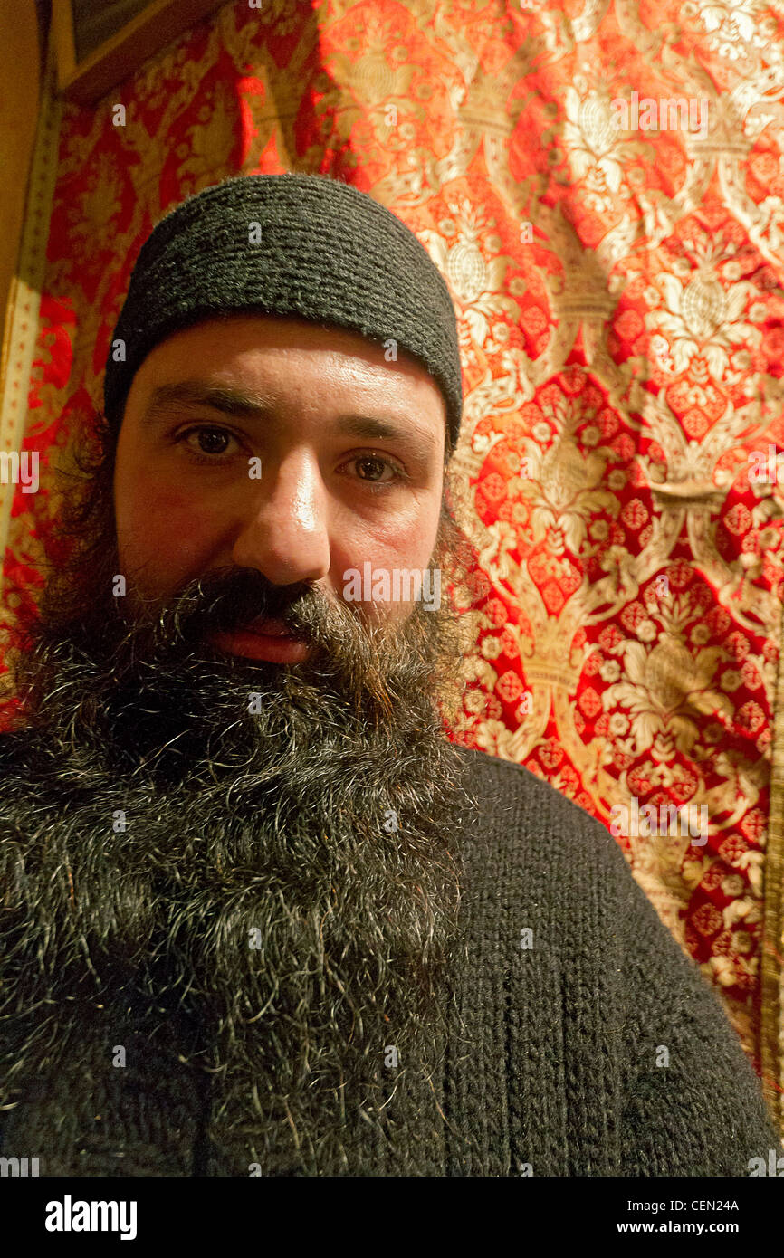 Greek Orthodox priest in the Church of the Nativity in Bethlehem, West ...
