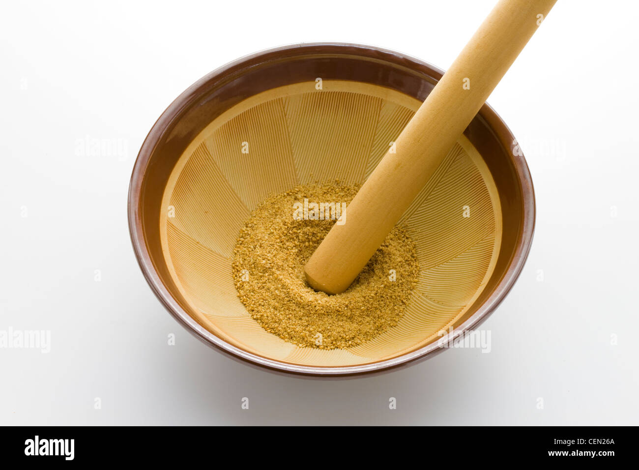 Sesame seeds getting grounded Stock Photo - Alamy