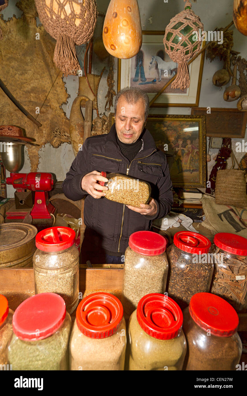Spice merchant in a shop in the market at the Old City of Akko (Acre ...