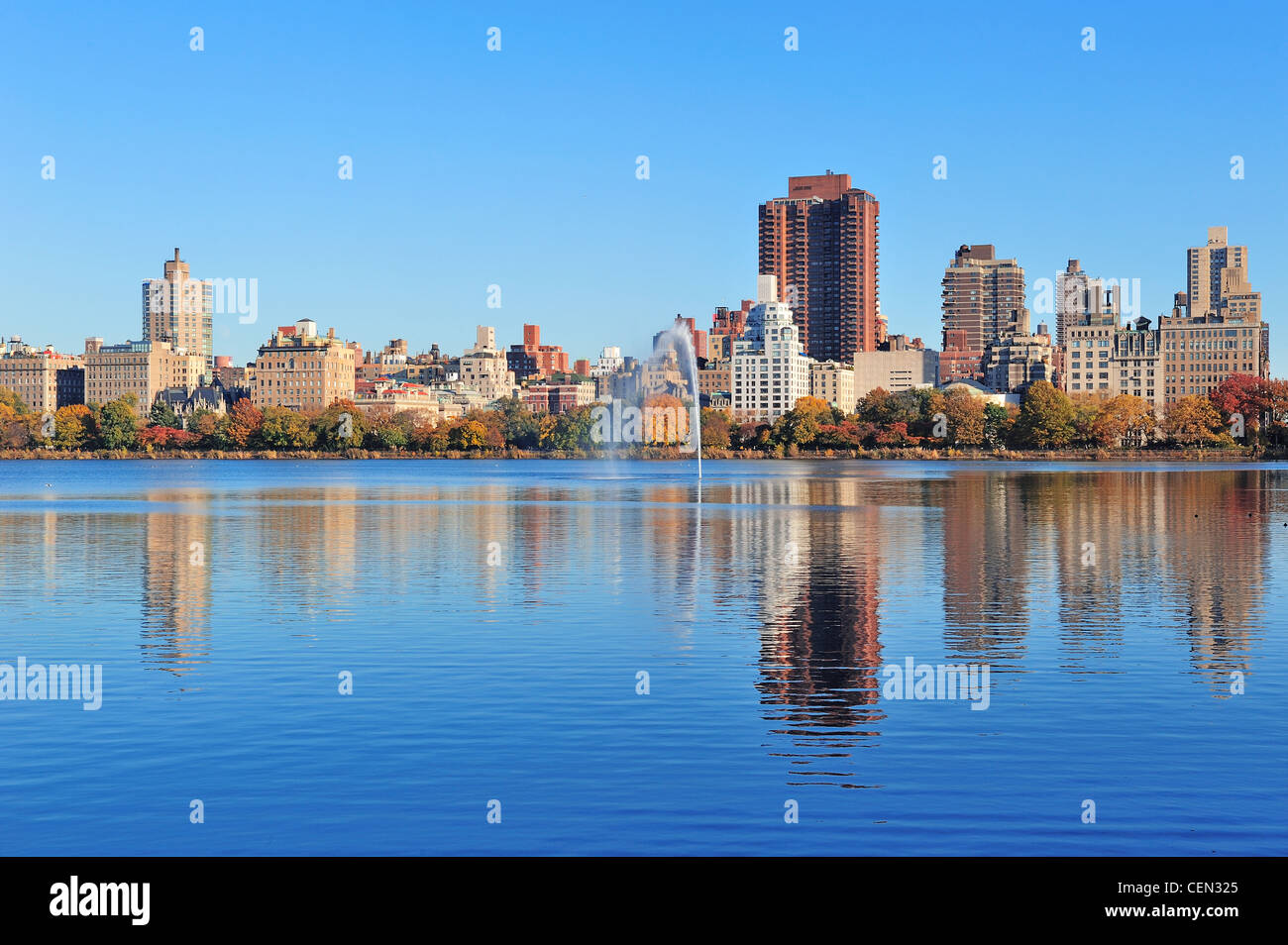 New York City Manhattan Central Park midtown skyline panorama over lake ...