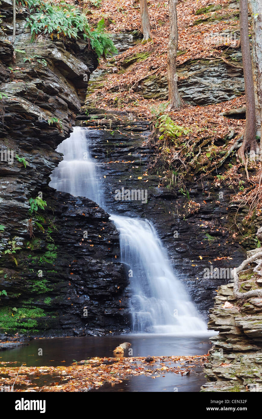 Autumn Waterfall in mountain with rocks and foliage. Bridle Vaill falls ...