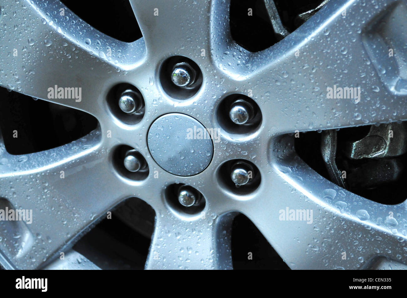 Close up shot of an auto wheel with water drops on its surface Stock ...