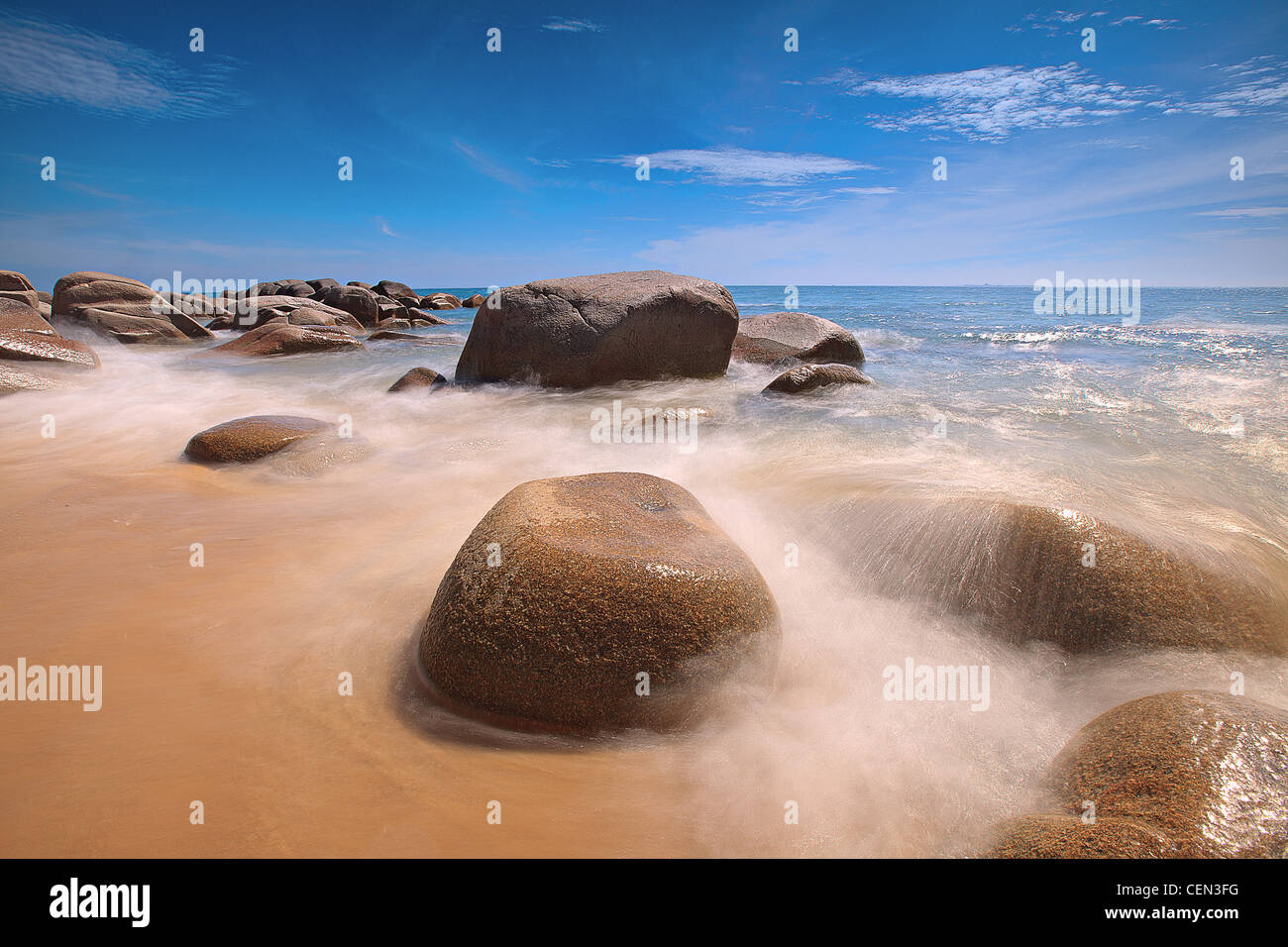 Beautiful seascape with large rocks and water in motion Stock Photo - Alamy