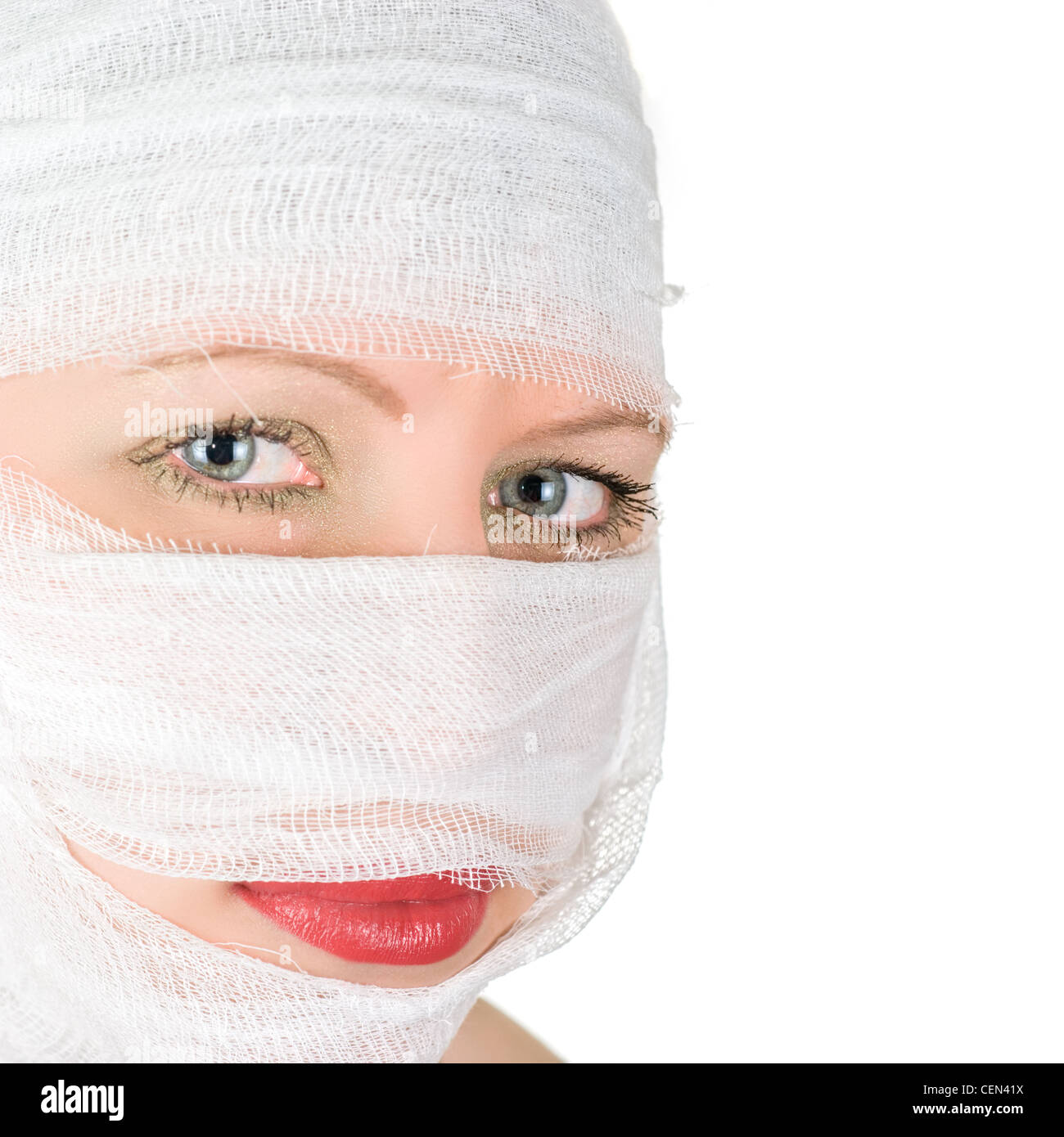 woman with bandages on her face on white Stock Photo - Alamy