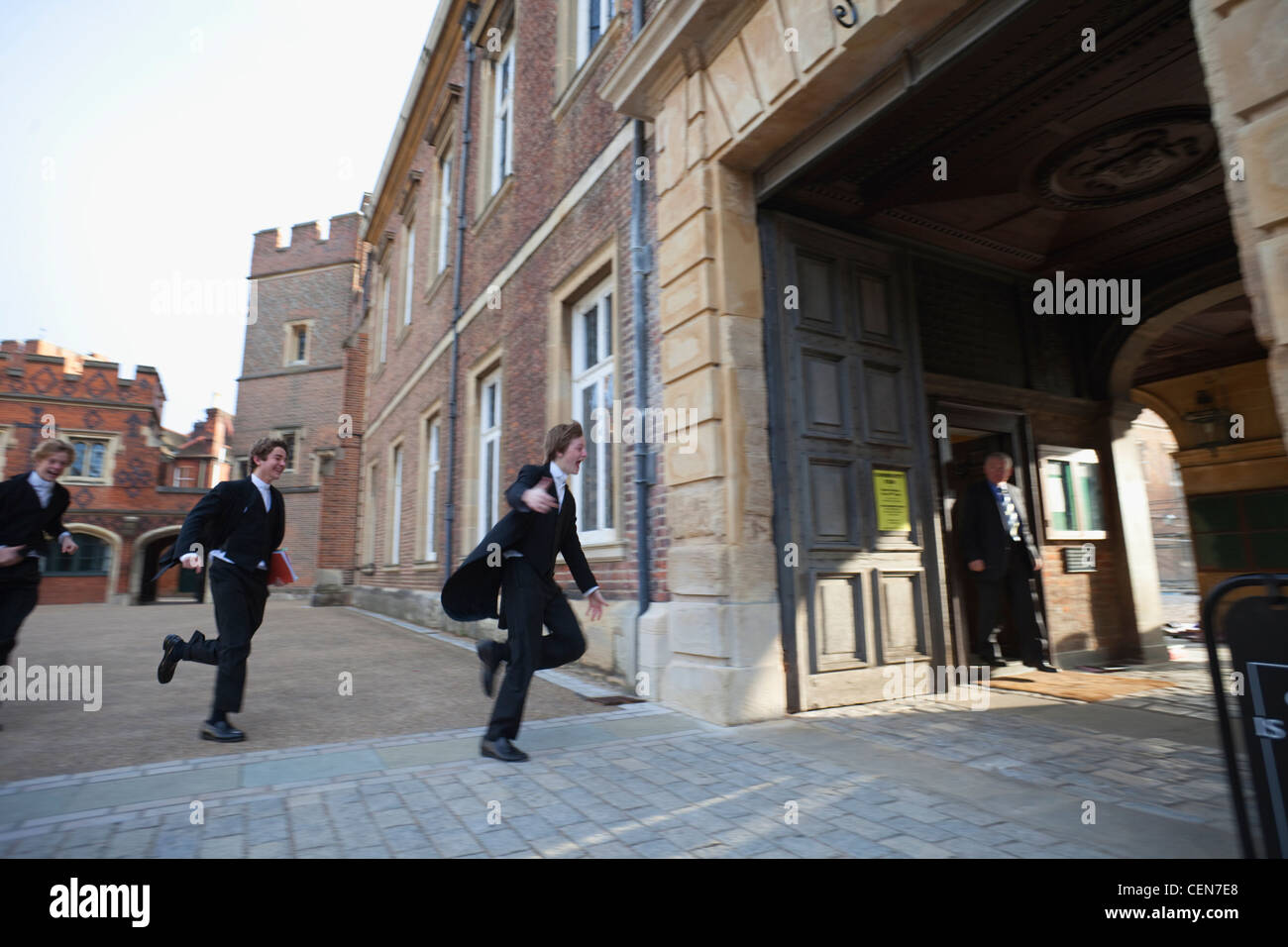 England, Berkshire, Eton, Students entering Eton College Stock Photo ...