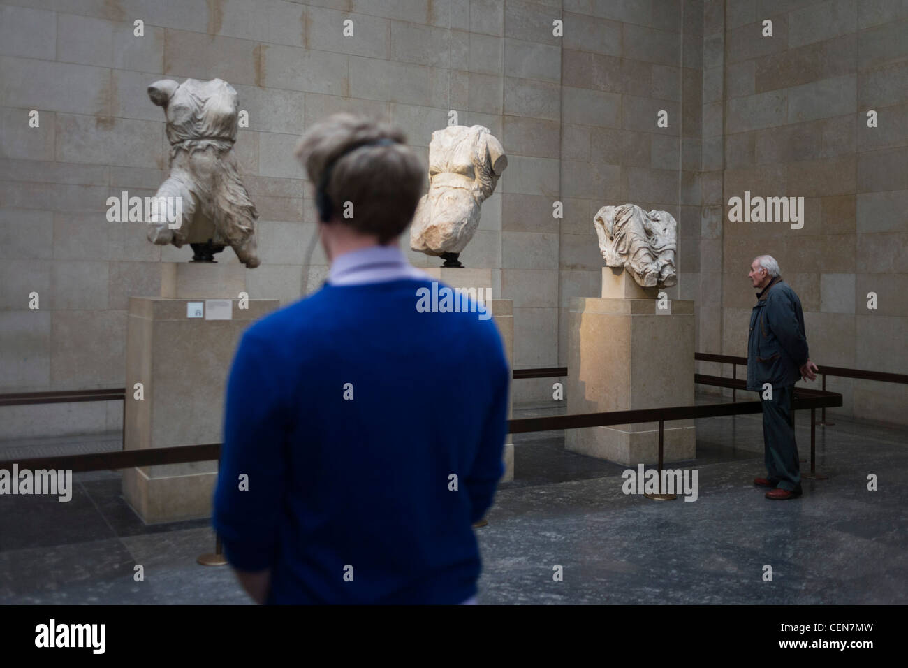 Visitors in London's British Museum admire the Ancient Greek Parthenon ...