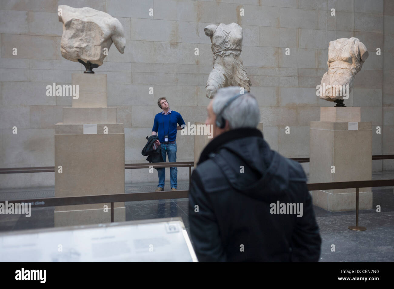 Visitors in London's British Museum admire the Ancient Greek Parthenon ...