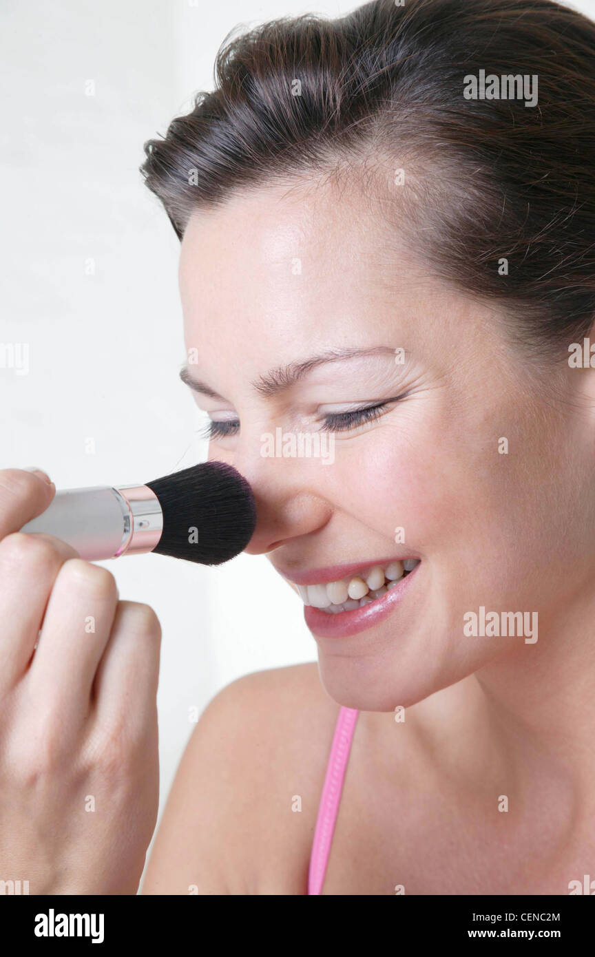 Profile of female brunette hair off face wearing pale pink eyeshadow ...