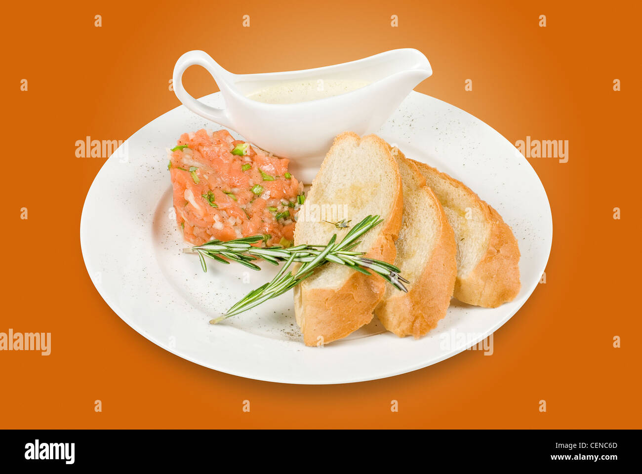 Tar-tar from salmon fish with green onion. Served with honey sauce and ...