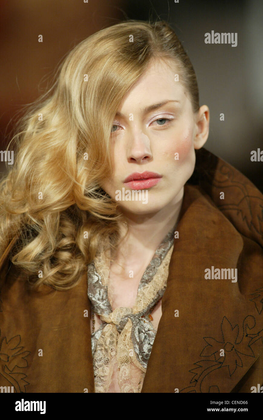 Raphael Lopez London Autumn Winter Model curly blonde hair to one side ...