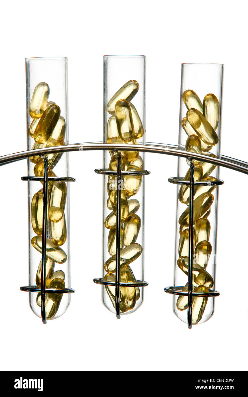 Generic liquid filled capsules in glass test tubes in a chrome stand ...