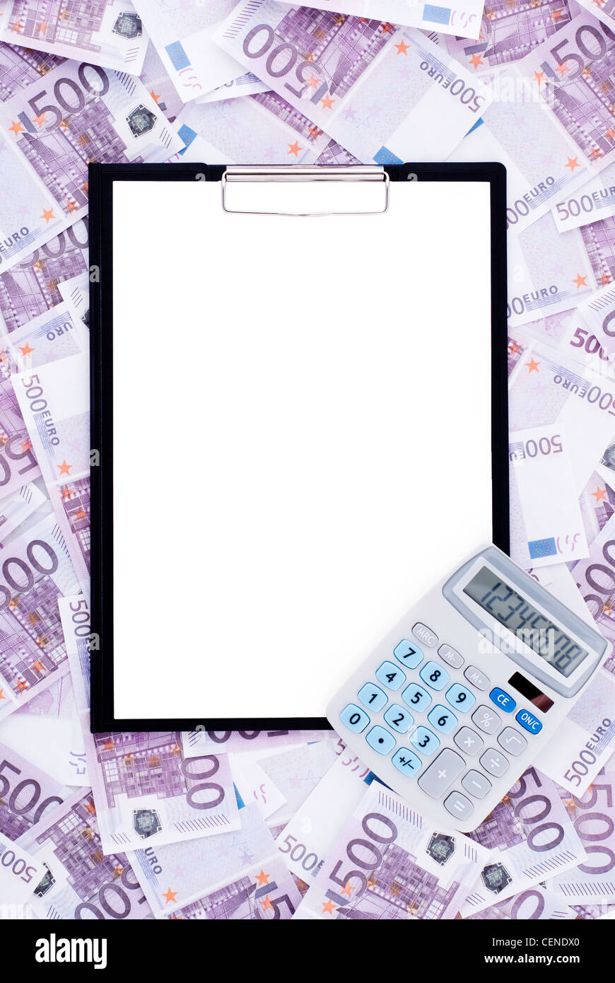 Clipboard and calculator surrounded by money Stock Photo - Alamy