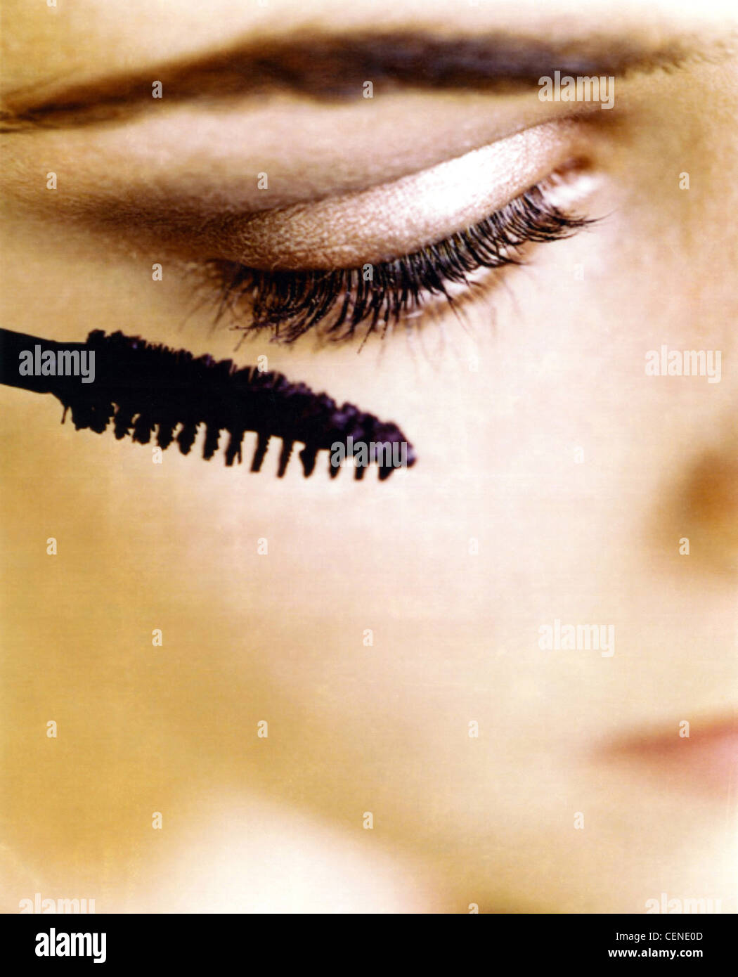 Close up image of female's eye, applying mascara Stock Photo - Alamy