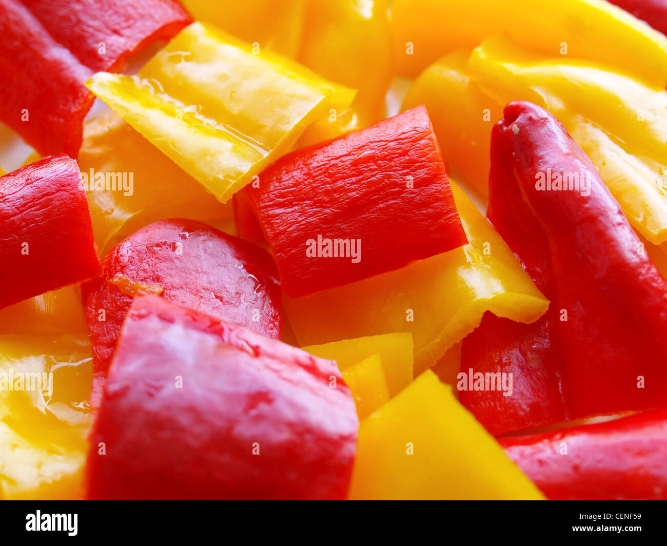 Red and yellow peppers useful as a food background Stock Photo - Alamy