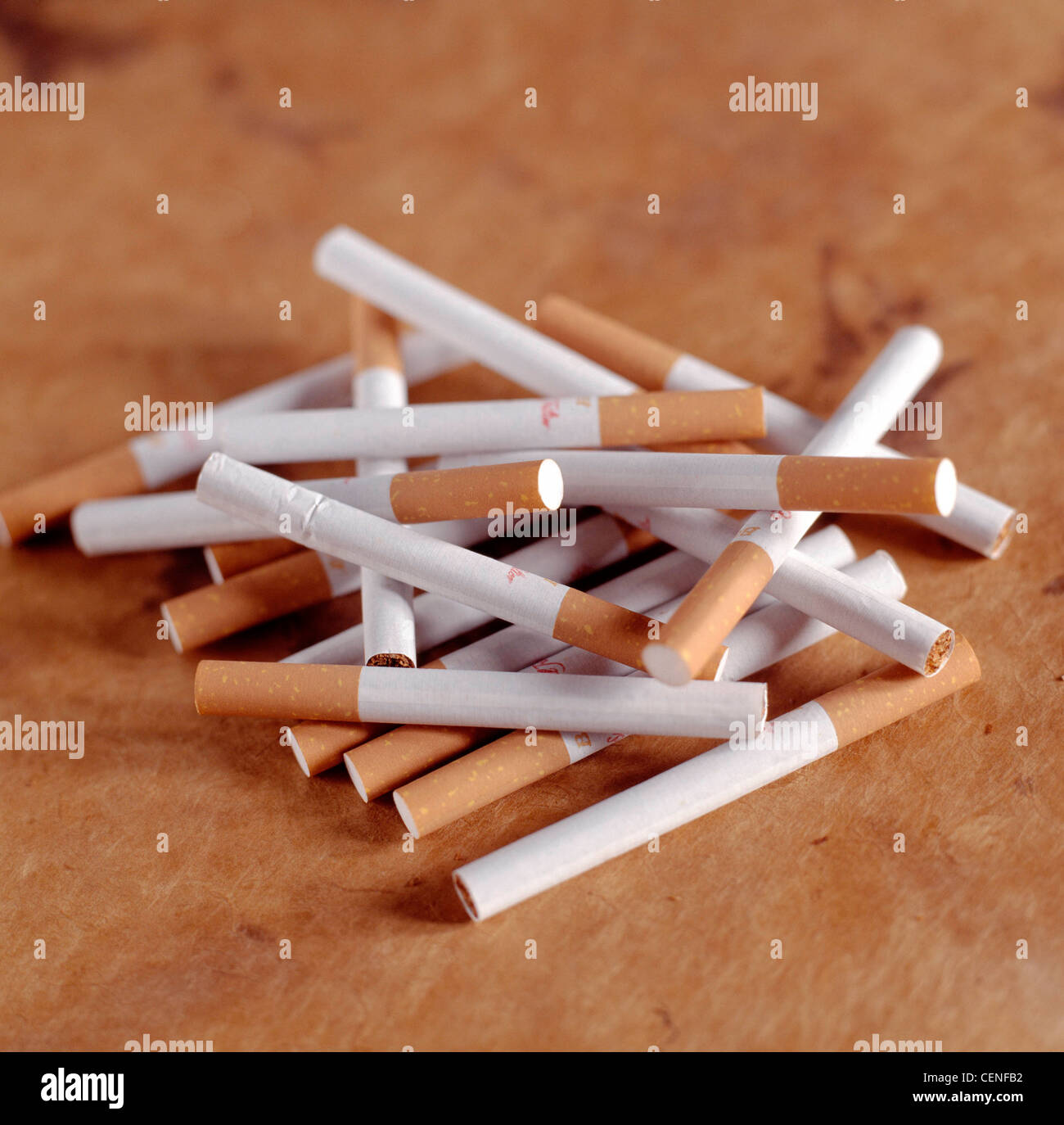 Pile of unsmoked cigarettes Stock Photo - Alamy