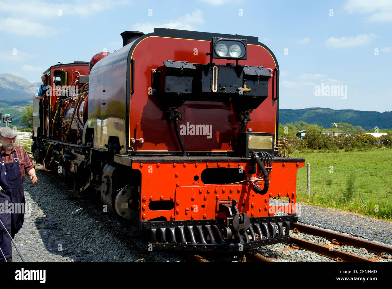 welsh highland railway train with mountains in distance pont croesor near porthmadog gwynedd ...