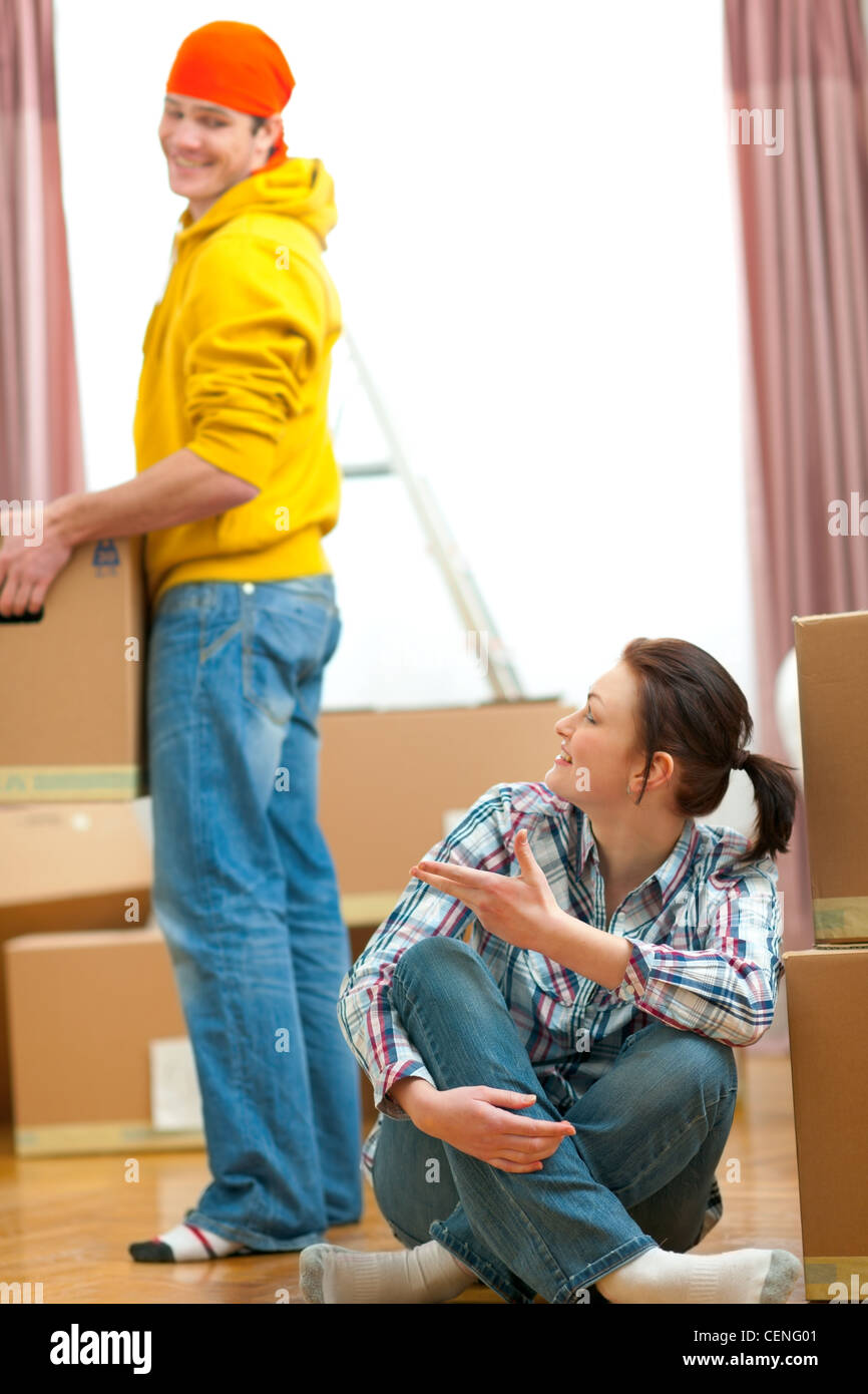 Happy young couple moving to new house Stock Photo - Alamy