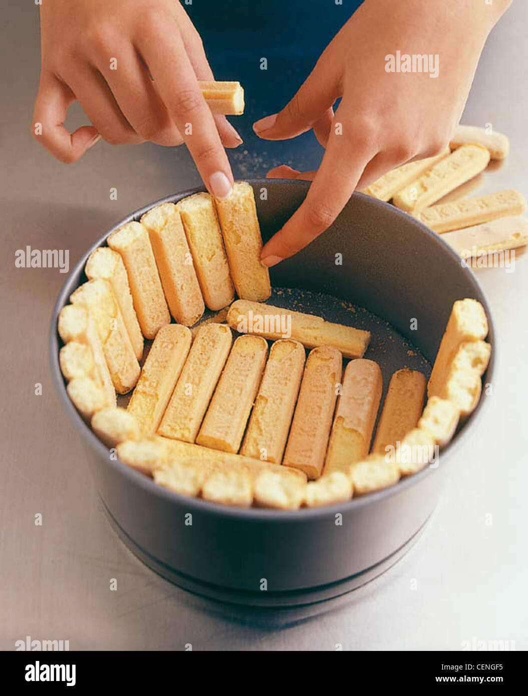 c "Step by Step strawberry charlotte" Lining cake tin with sponge ...