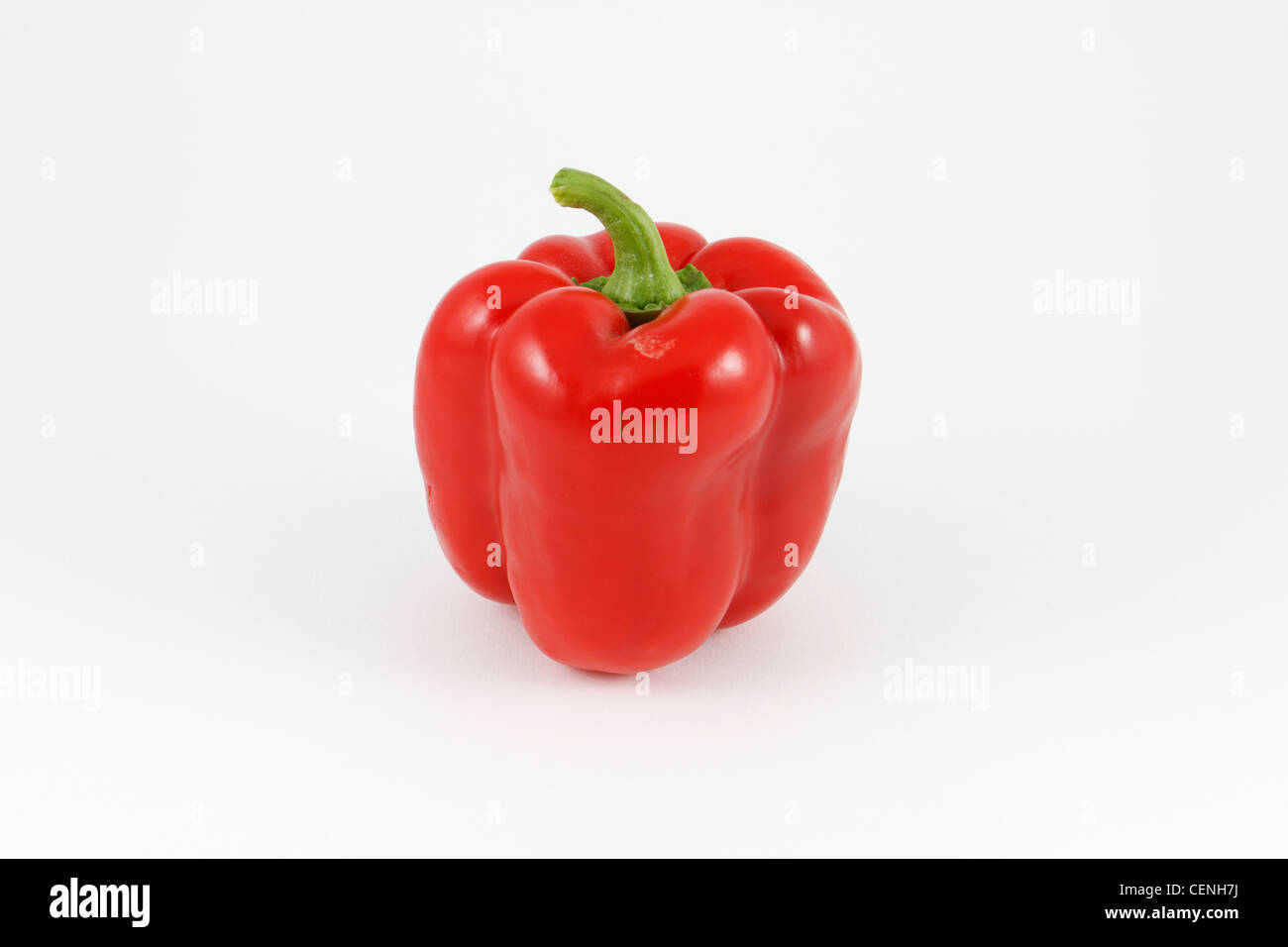 Whole red bell pepper, Capsicum annuum, vegetable on white background ...