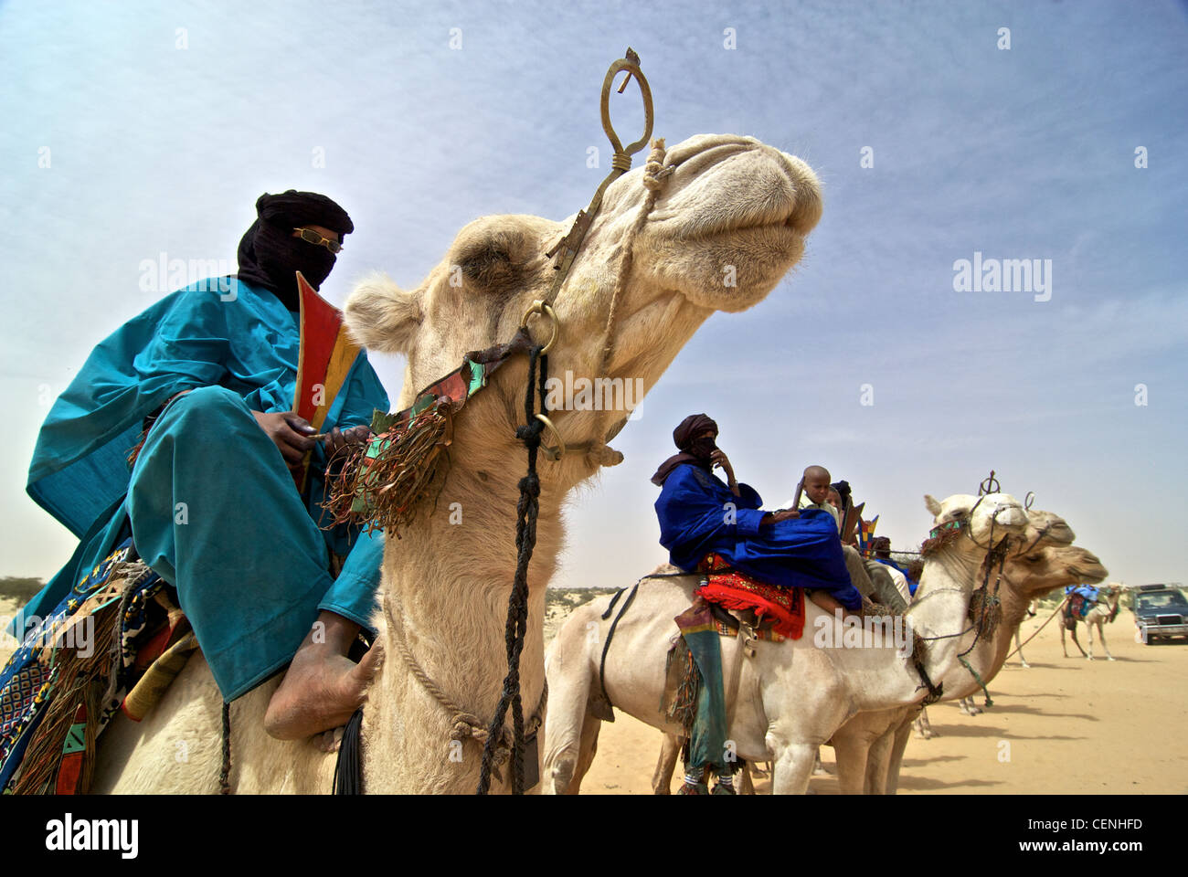 Tuareg men traveling by camel in the Sahara desert, Timbuktu, Mali ...