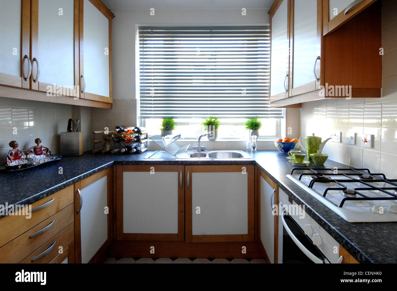 Chelsea appartment Kitchen interiwith white unit doors, silver handles ...