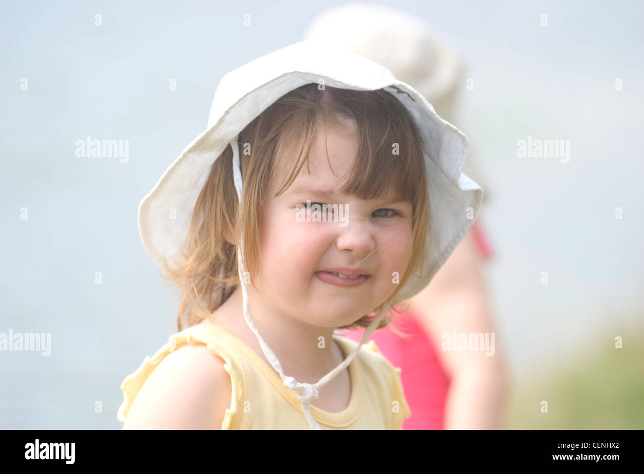Ribbon under chin hi-res stock photography and images - Alamy