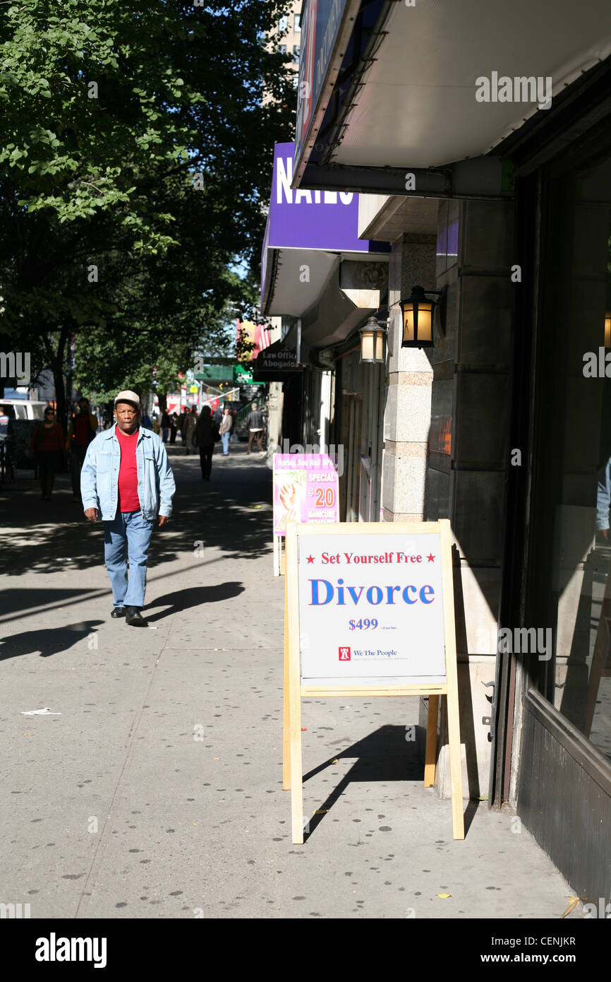 Sign advertising divorce for $499 on 14th Street New York Stock Photo ...