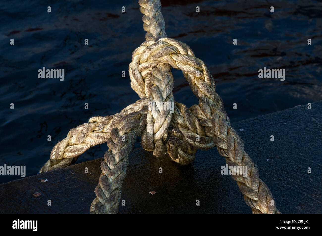 Close up of trawlers rope tied at harbour Stock Photo - Alamy