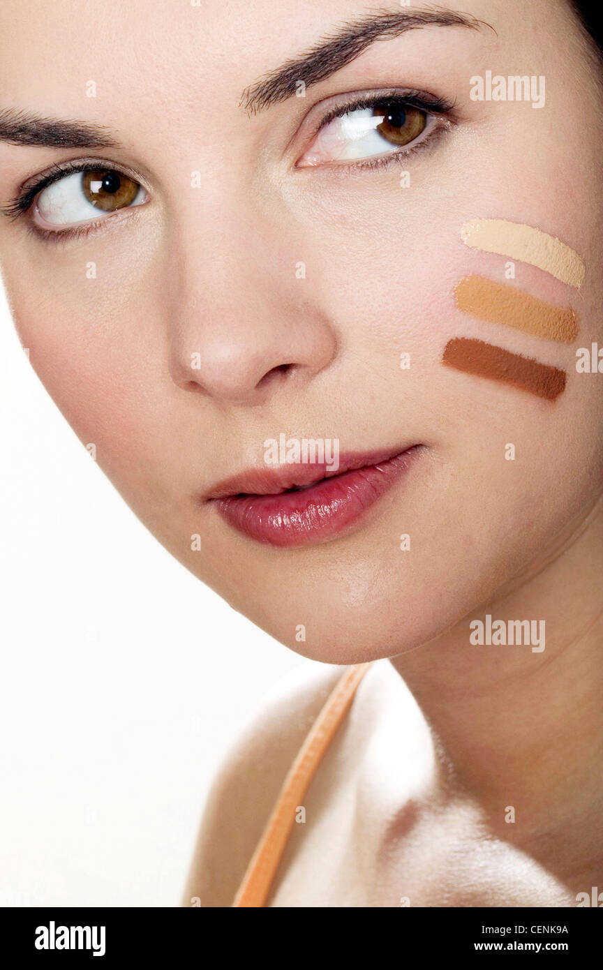 Cropped image of female brunette hair off face three stripes of ...