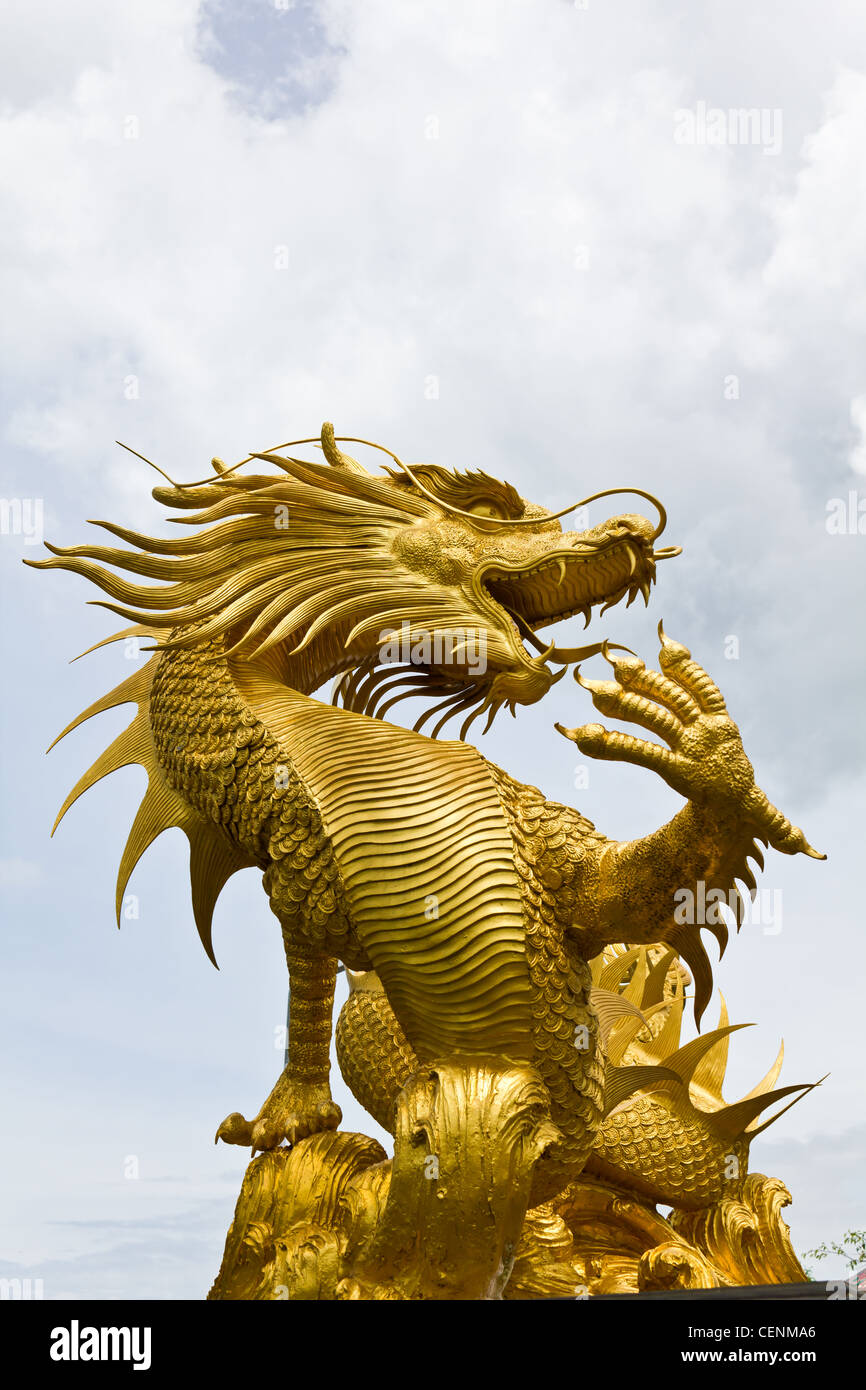 Colorful golden dragon statue in Chinese temple Thailand Stock Photo ...