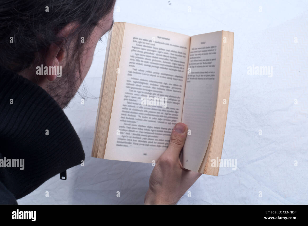 Book held open hi-res stock photography and images - Alamy