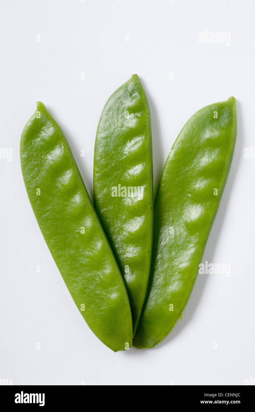 Foreign Vegetables: Full length of three mange tout spread out evenly ...
