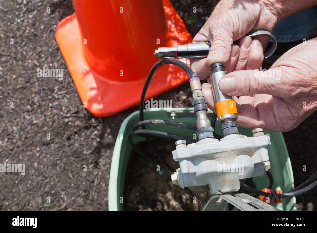 Cable installer adding filter to cable connection Stock Photo - Alamy
