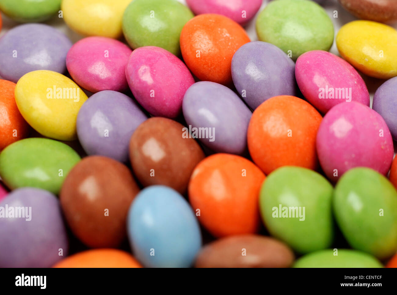 Multi coloured sugar coated chocolate Stock Photo - Alamy