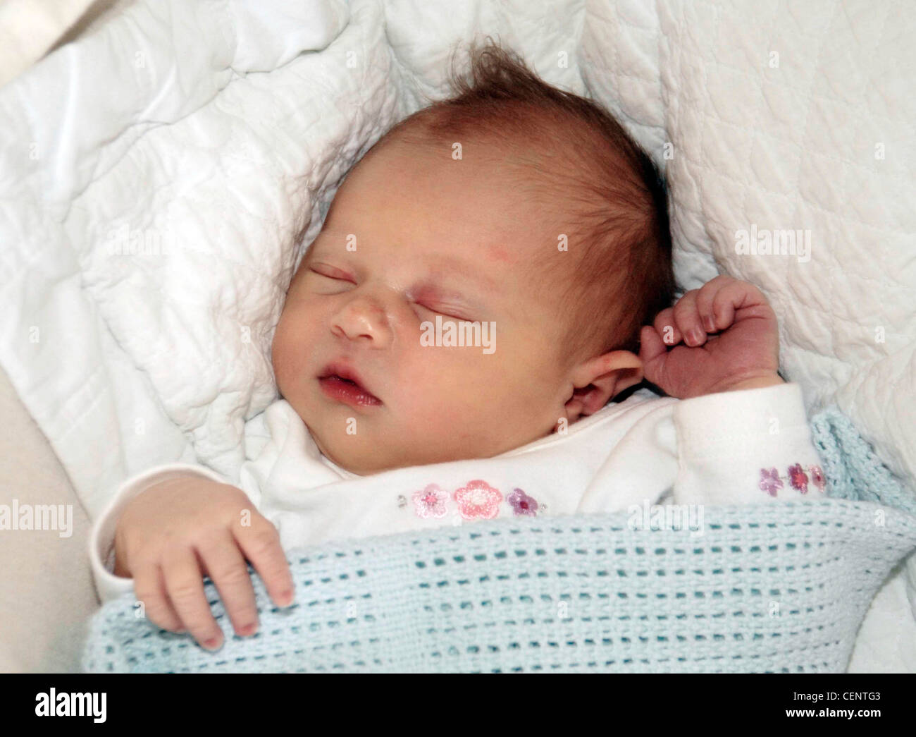 Female baby wearing blue babygro hi-res stock photography and images ...