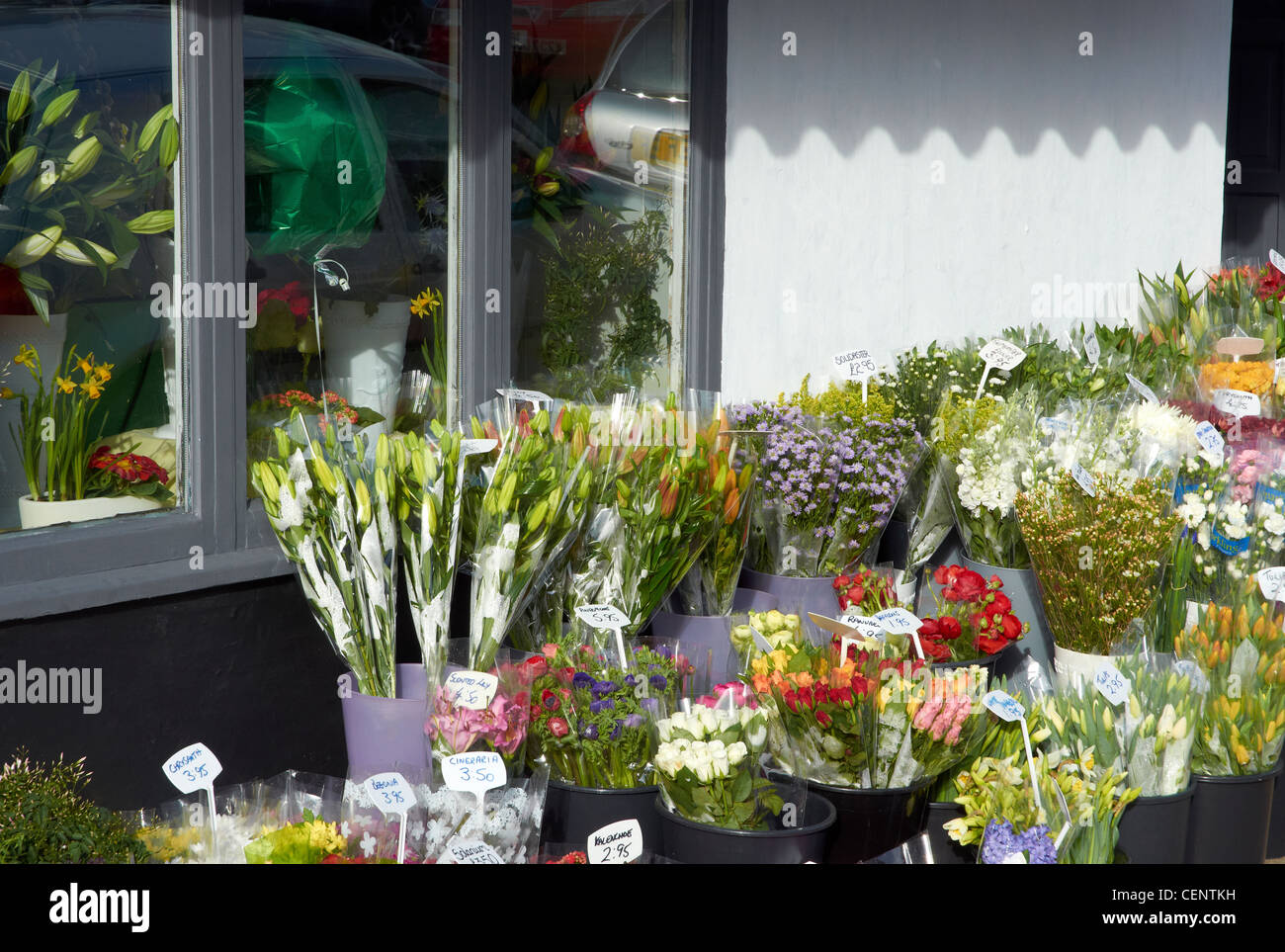 Cut flowers displayed outside a florists shop in the market town of ...