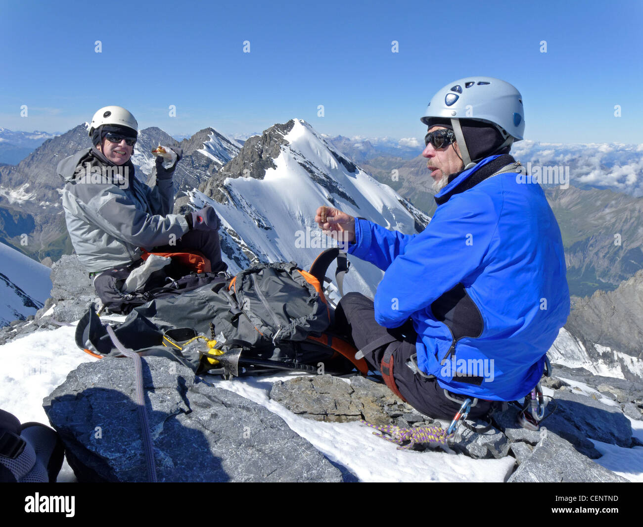 Alpine climbers on a narrow snow ridge hi-res stock photography and ...