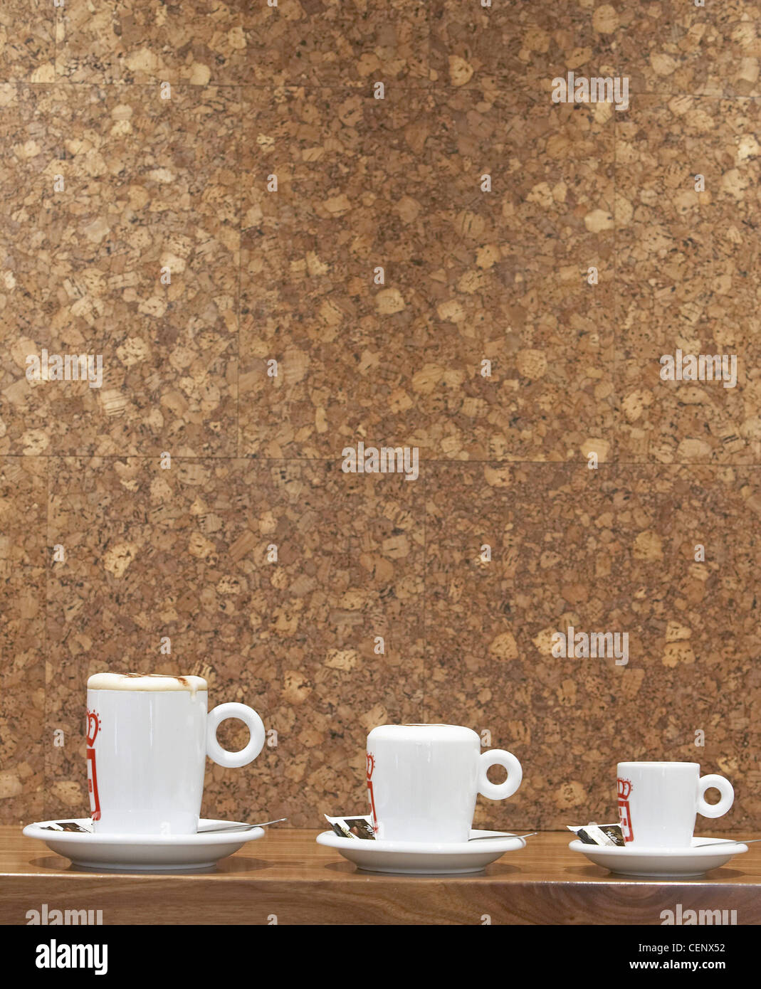 Three coffee cups in a row; latte, cappuccino and espresso Stock Photo ...