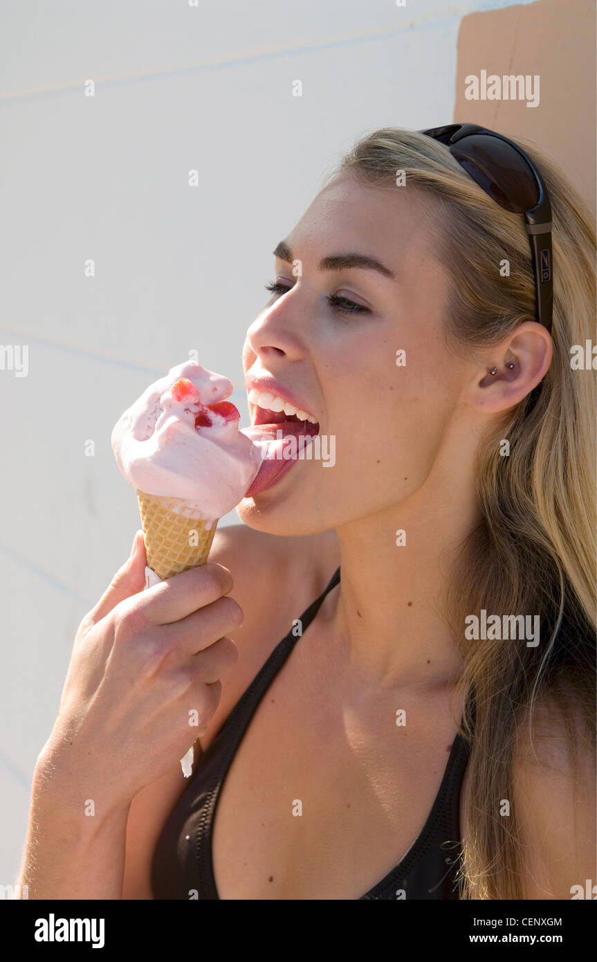 Female Very Long Blonde Hair Wearing Brown Halter Neck Bikini And