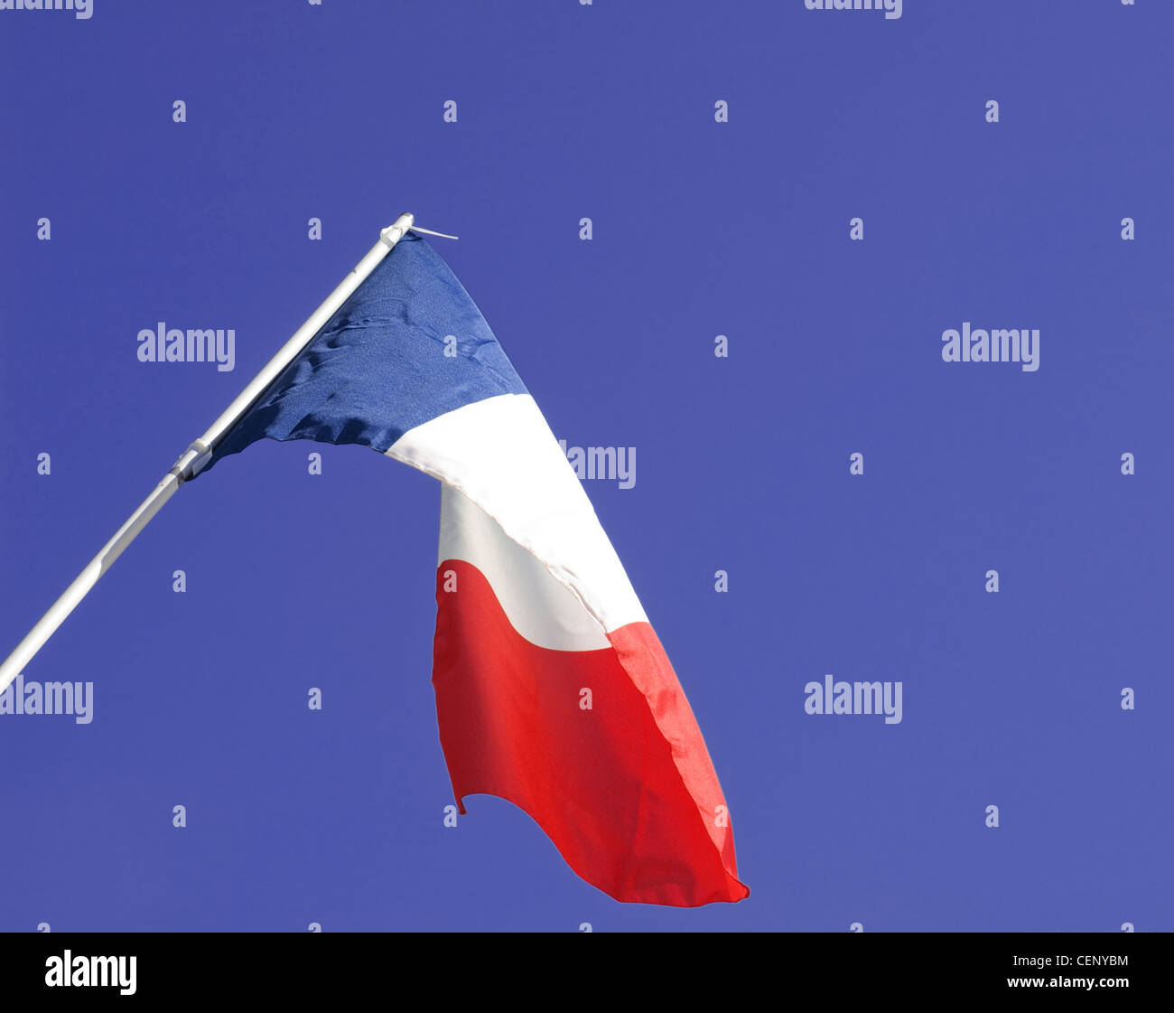 Flag of France over blue sky background Stock Photo - Alamy