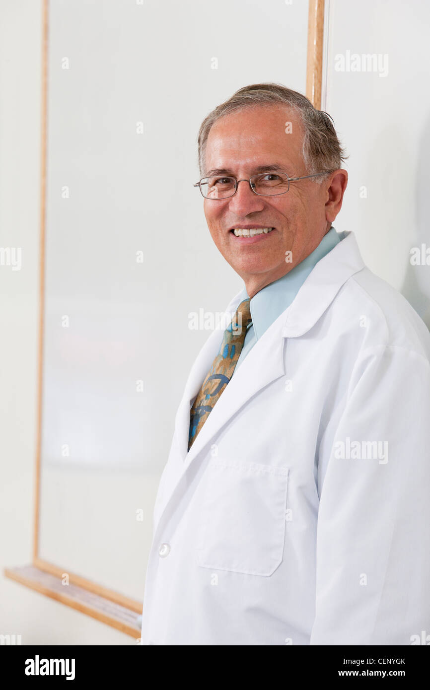Portrait of a professor smiling Stock Photo - Alamy
